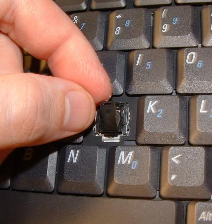 Cómo volver a insertar la tecla cuando una tecla se cae del teclado de ...